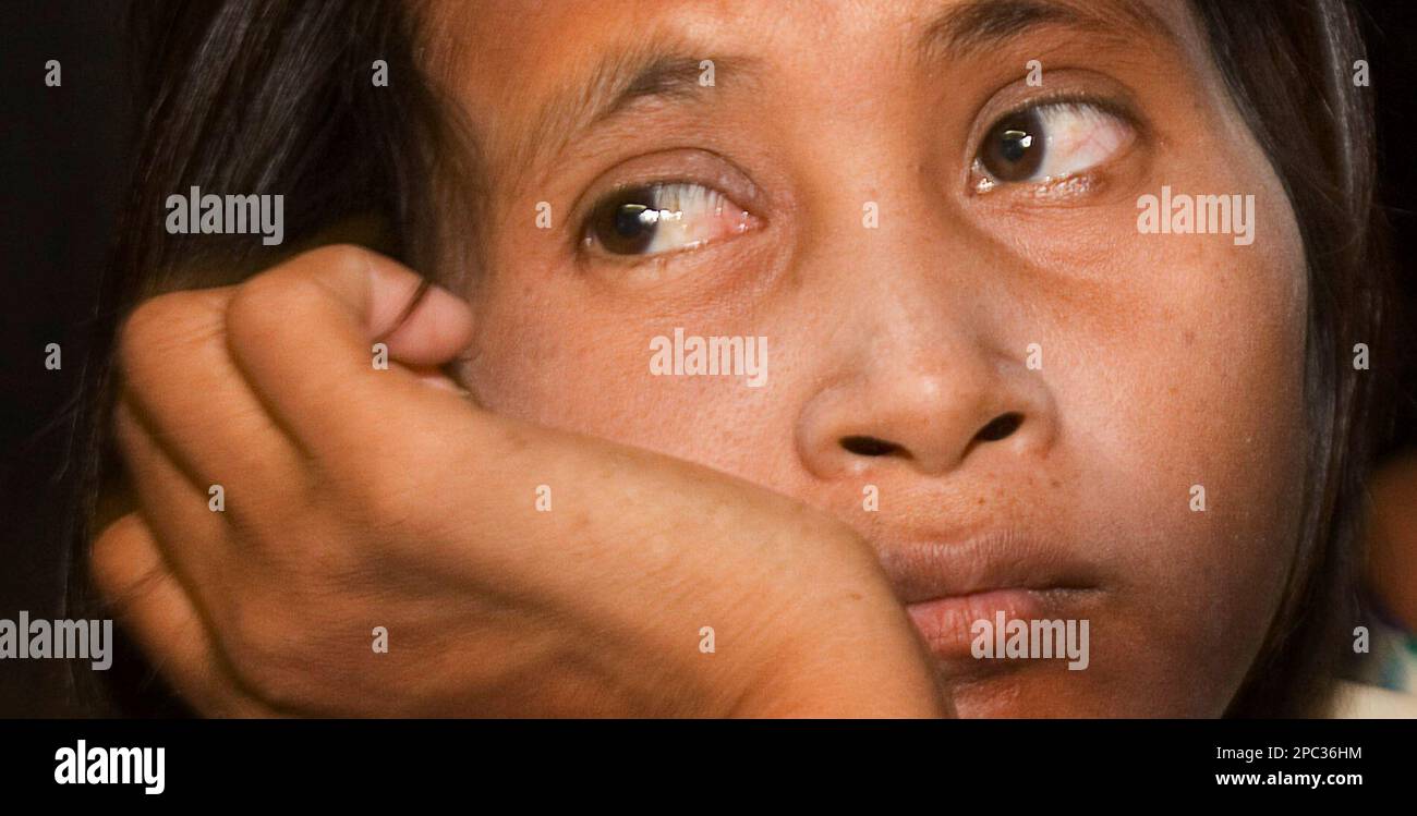 Rochom P'ngieng, looks on at her rural home Saturday, Jan. 20, 2007, in ...