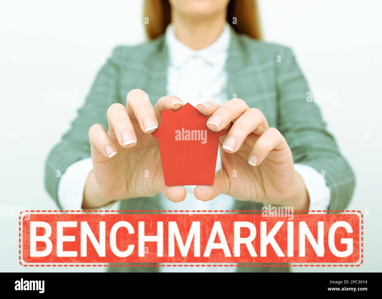 Text caption presenting Benchmarking. Word Written on Evaluate ...