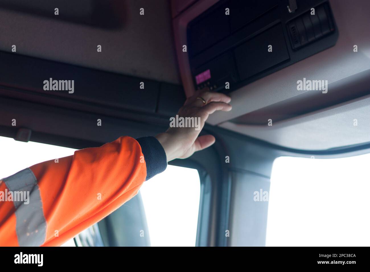truck driver manipulating the tachograph, rest times, transport ... truck driver manipulating the tachograph, rest times, transport ...