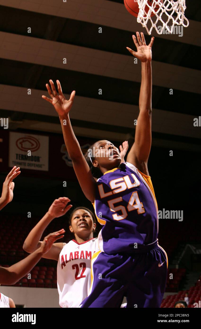 LSU's Ashley Thomas (54) goes up for a shot in front of Alabama's ...