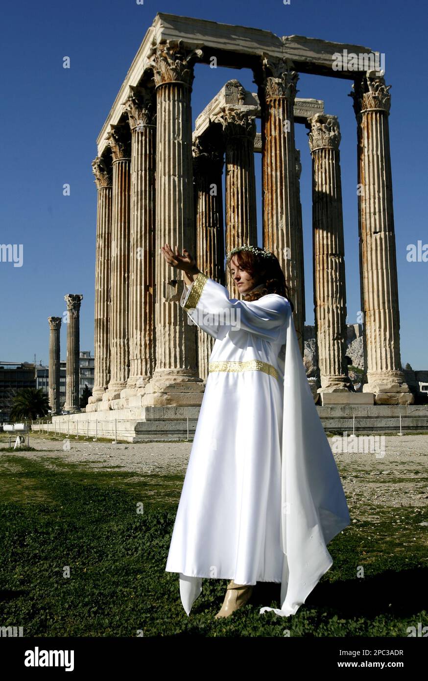 A female priestess participates in a rare ceremony honoring Zeus, the ...
