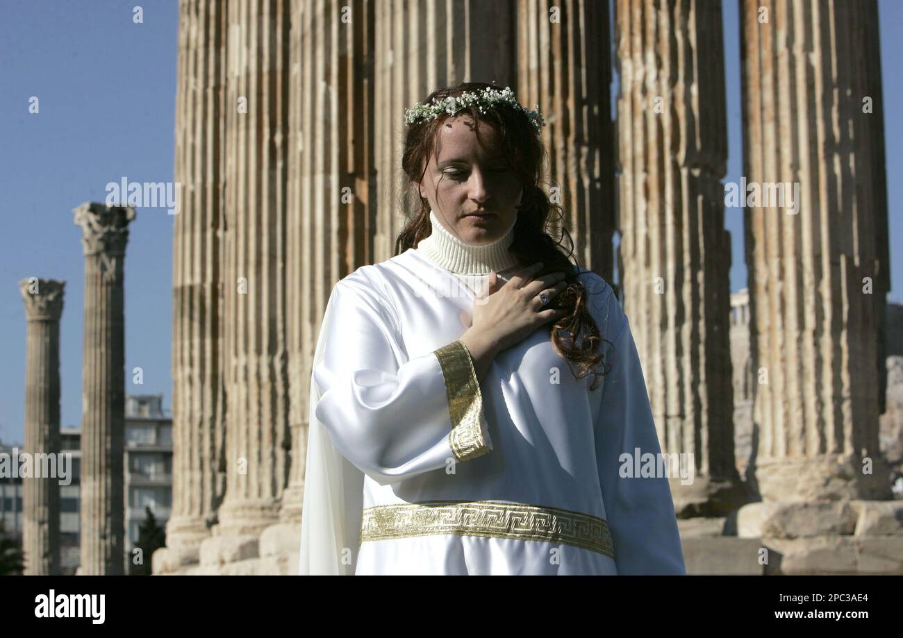 A female priestess participates in a rare ceremony honoring Zeus, the ...