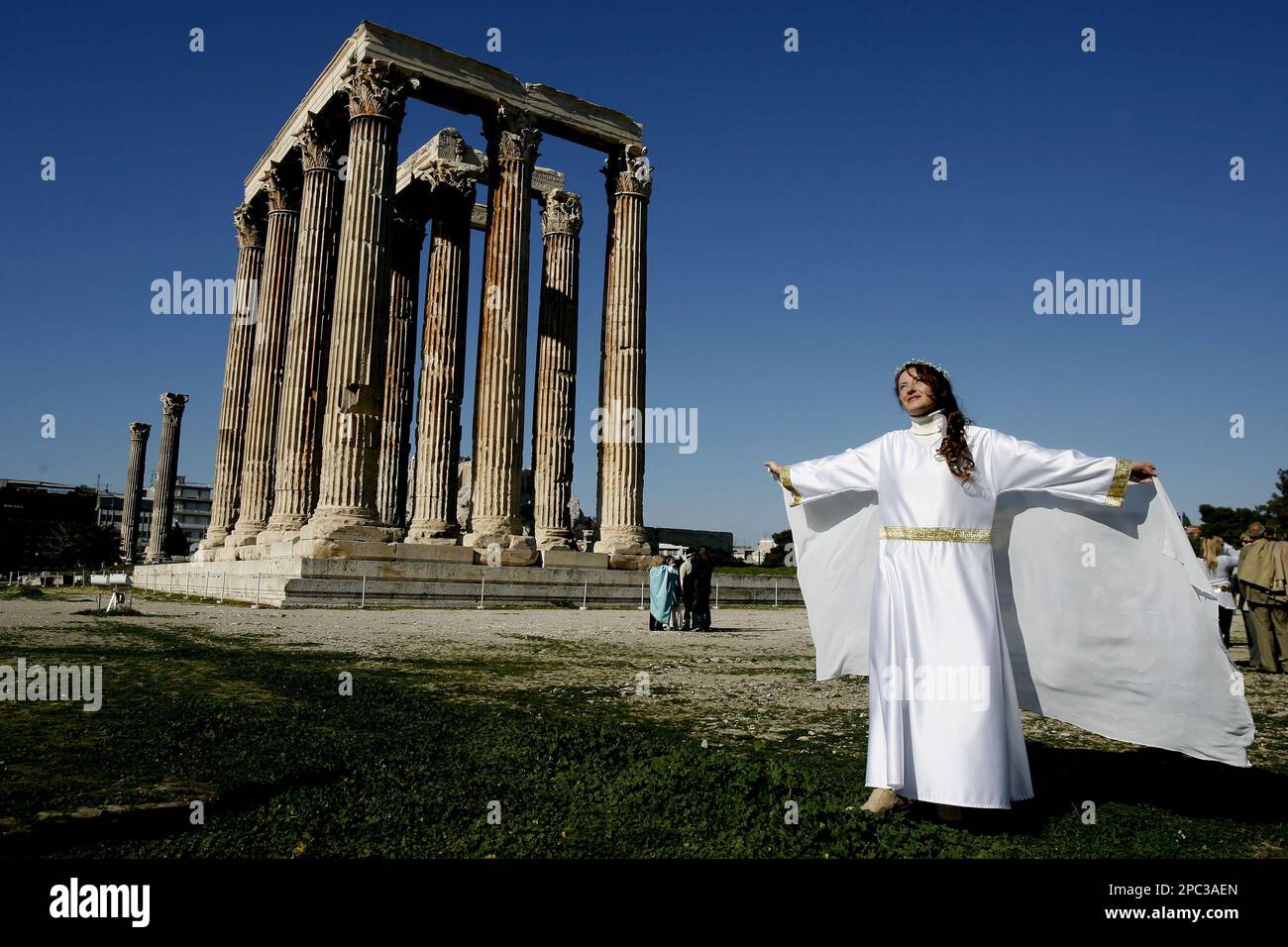 A female priestess participates in a rare ceremony honoring Zeus, the ...