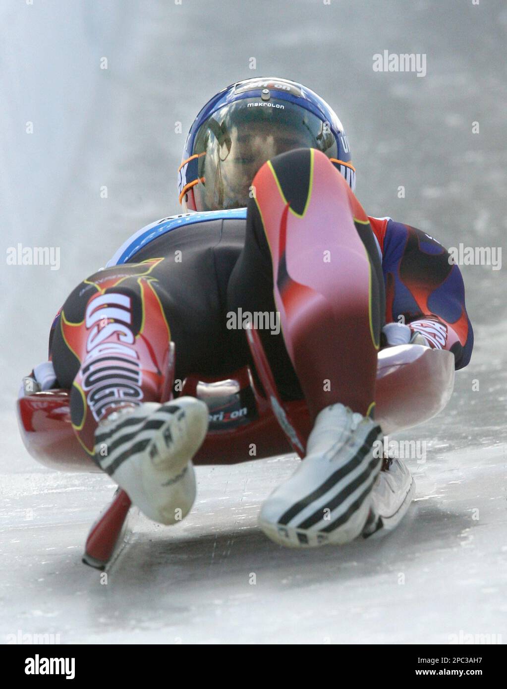 Tony Benshoof, of the USA, speeds down the ice track shortly after the ...
