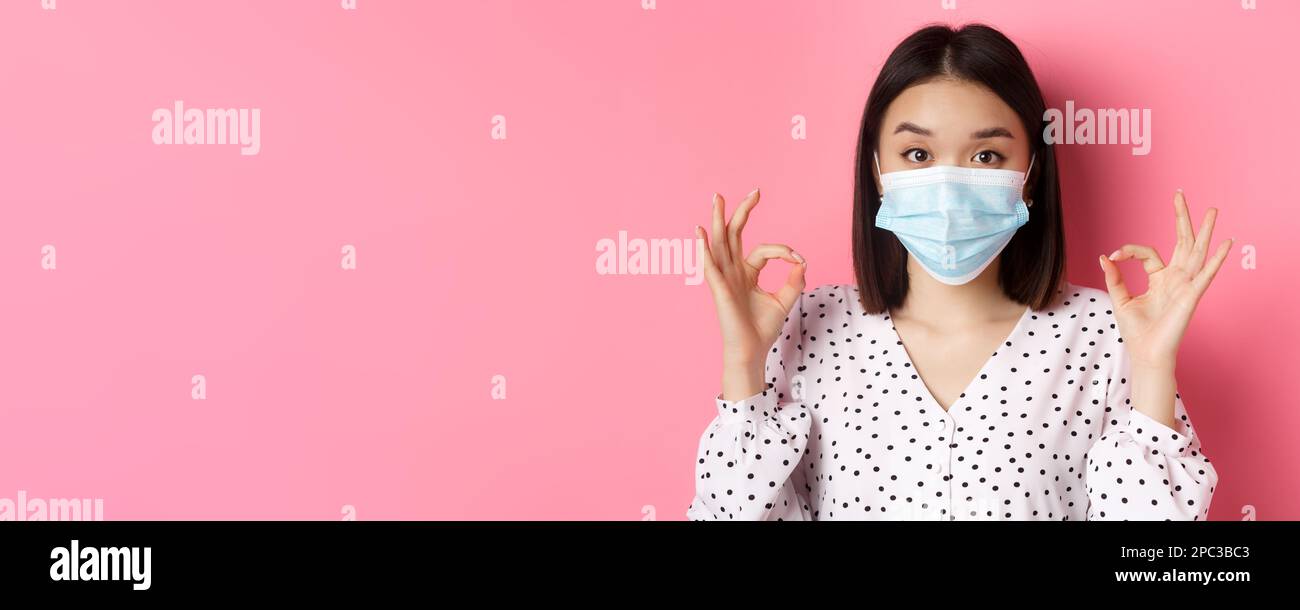 Covid-19, pandemic and lifestyle concept. Image of cute asian woman in ...