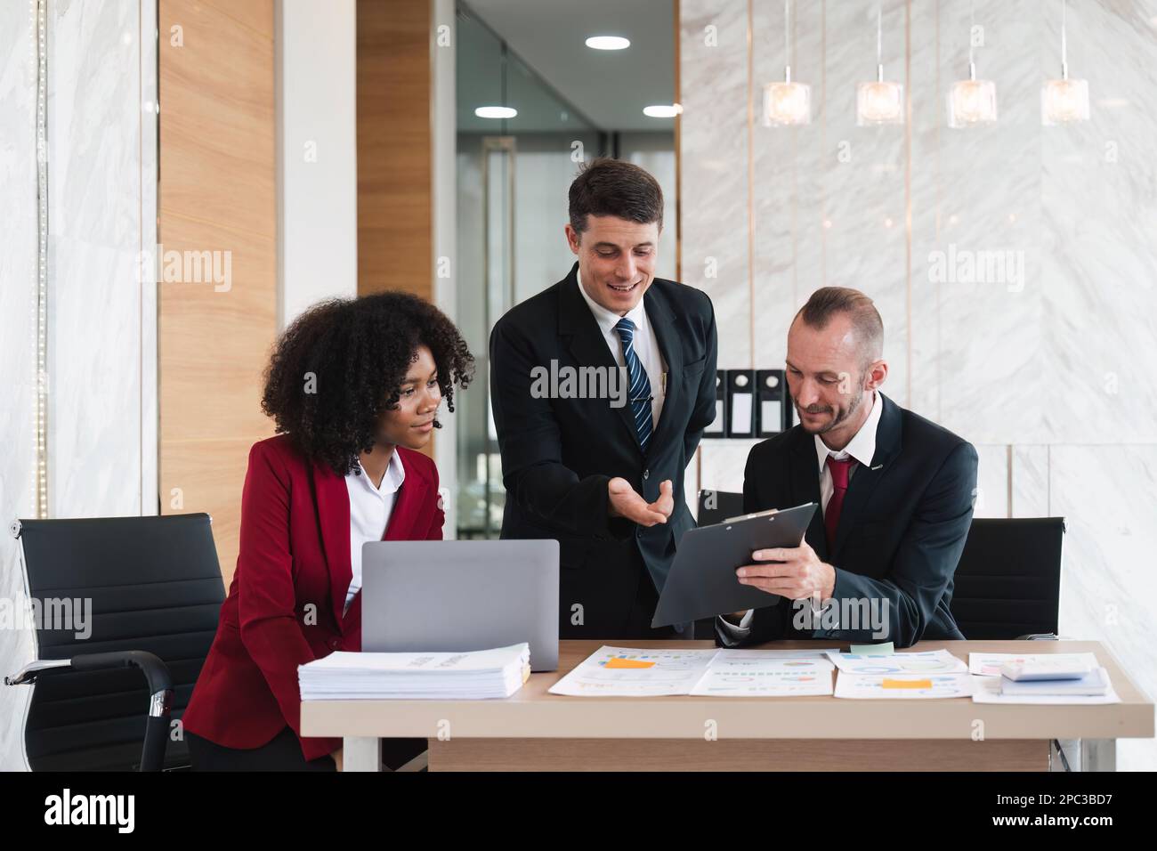 Diverse business team discussing project at corporate briefing in ...