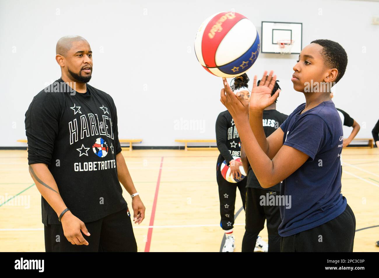 EDITORIAL USE ONLY Scooter Christensen from the Harlem Globetrotters ...