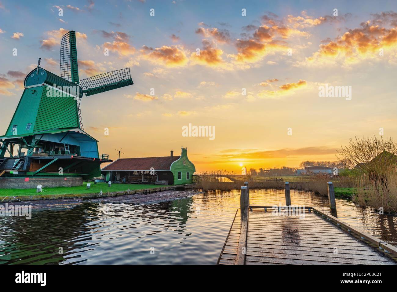 Sunrise at Zaanse Schans village with Dutch Windmill near Amsterdam ...