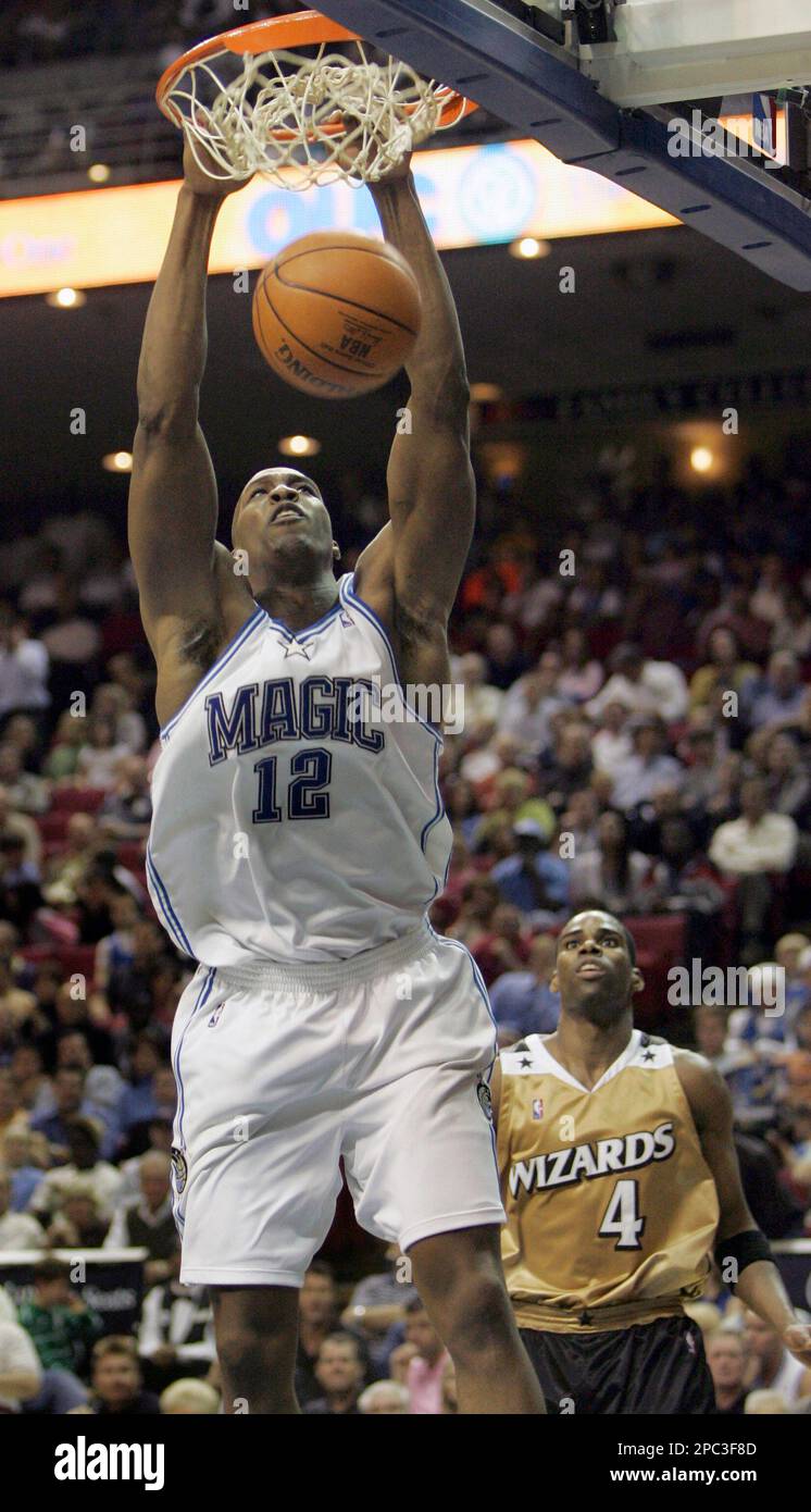 Orlando Magic's Dwight Howard dunks as Washington Wizards forward ...