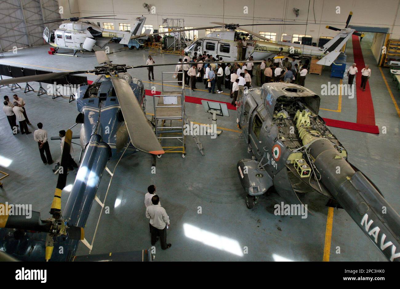 Hindustan Aeronautics Limited (HAL) engineers work on unfinished Dhruv ...