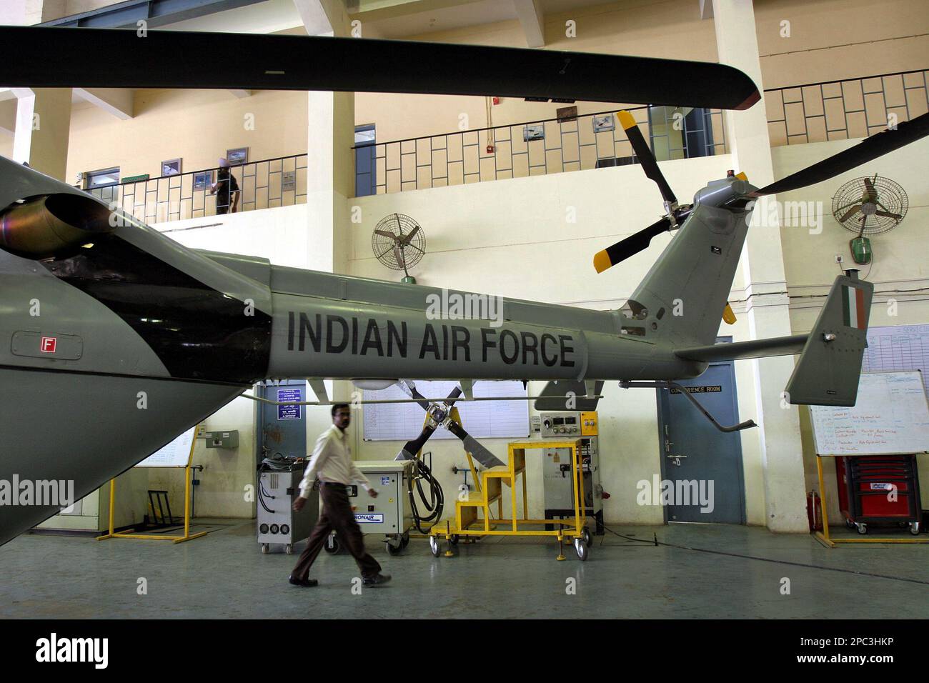 A Hindustan Aeronautics Limited (HAL) employee walks past an unfinished ...