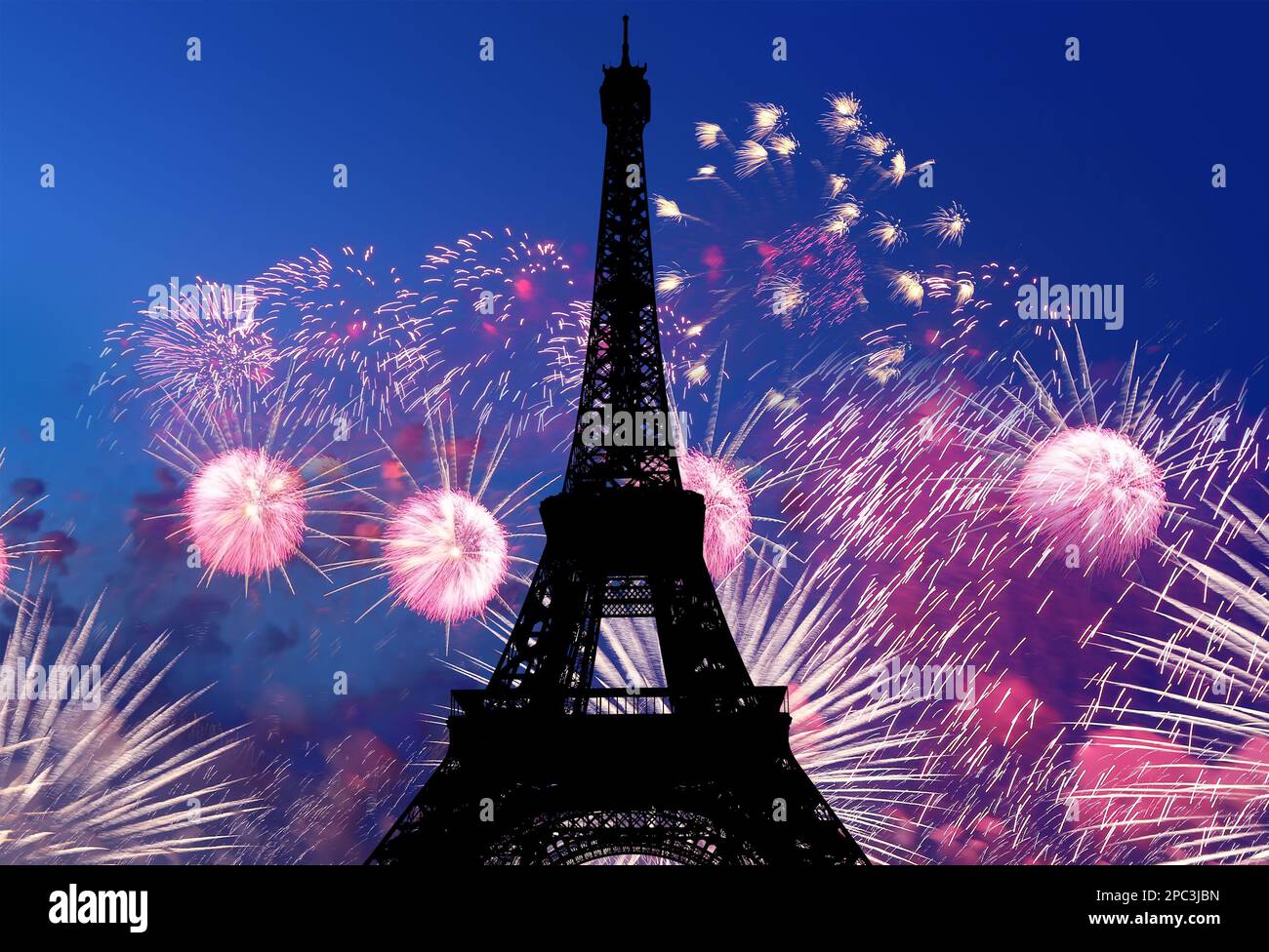 Celebratory colorful fireworks over the Eiffel Tower in Paris, France ...