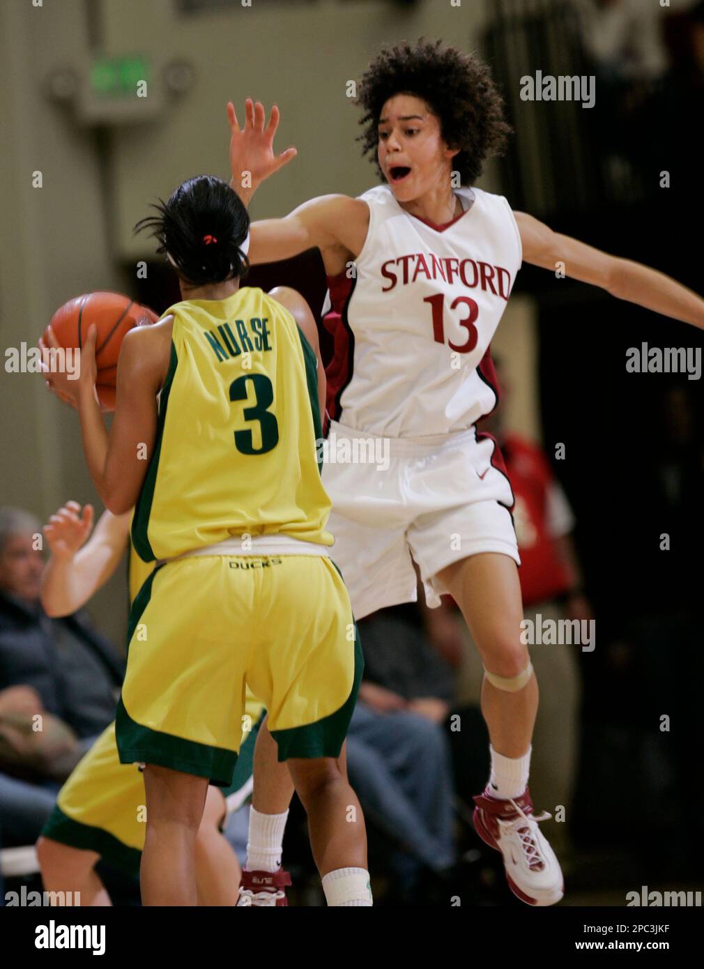 Stanford guard Cissy Pierce, right, blocks Oregon guard Tamika Nurse (3 ...