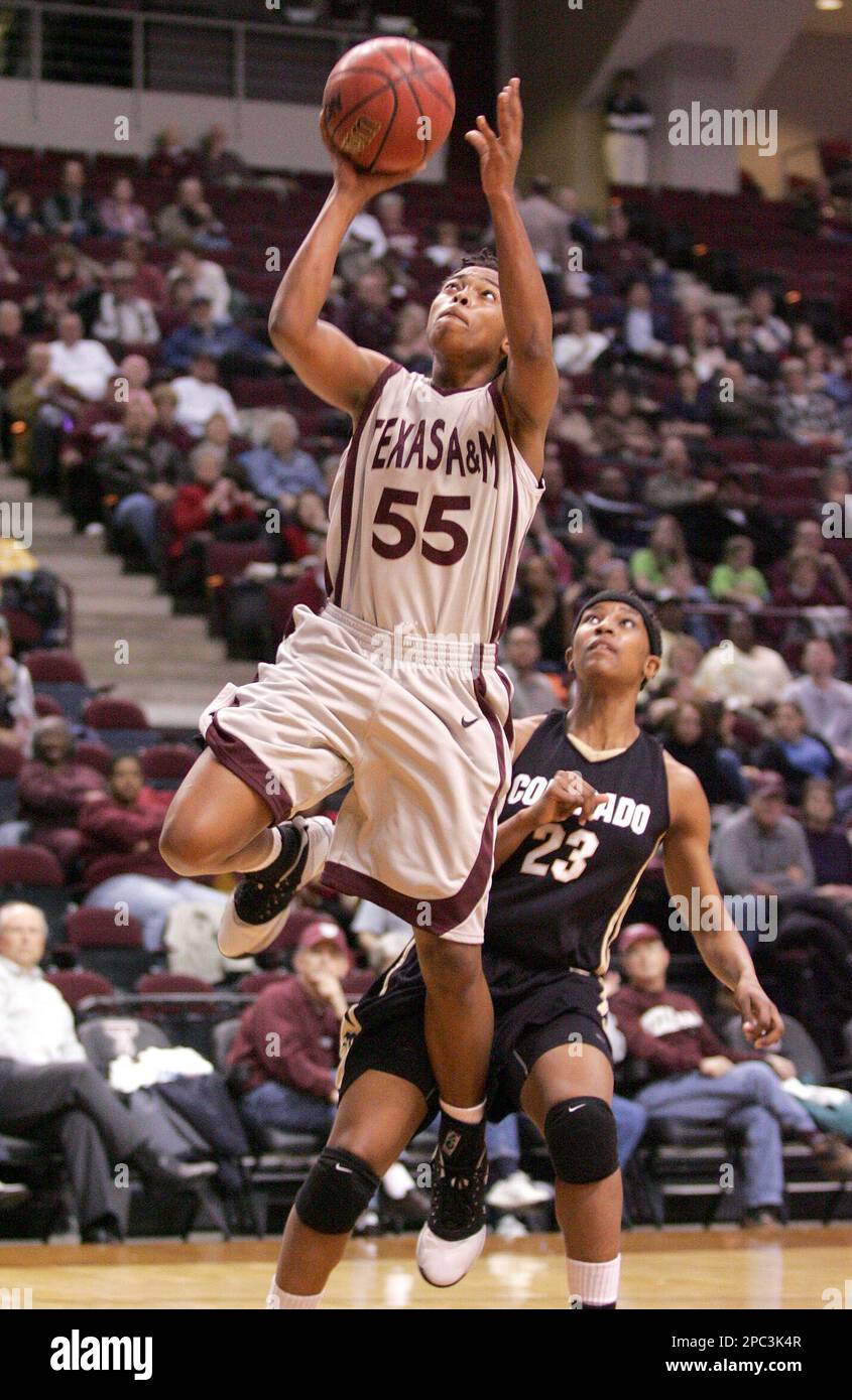 Texas A&M's Danielle Gant (55) goes for the layup in front of Colorado ...