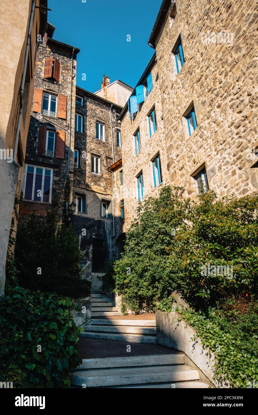 Stone facades of old houses and stairs in the historic center of ...
