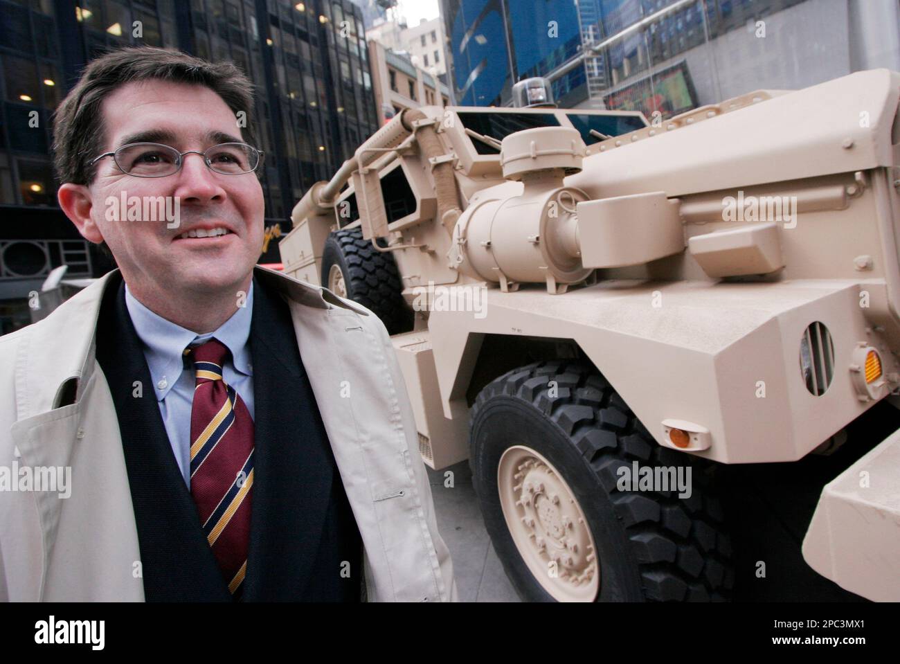 Frank Kavanaugh, Chairman of Force Protection, Inc., poses with a ...