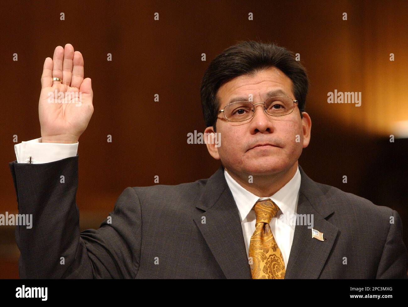 Attorney General Alberto Gonzales is sworn in on Capitol Hill in ...