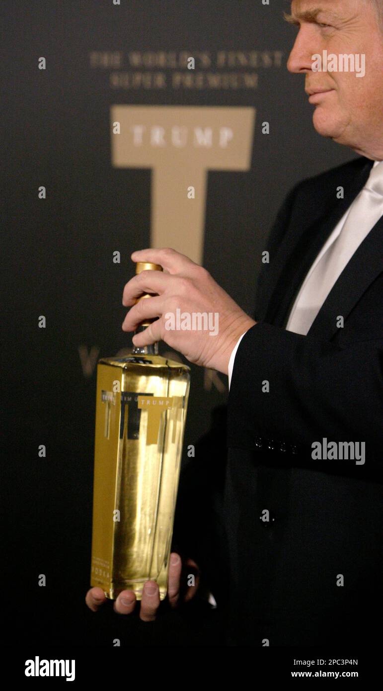 Developer Donald Trump holds a bottle of his new line of vodka as he ...