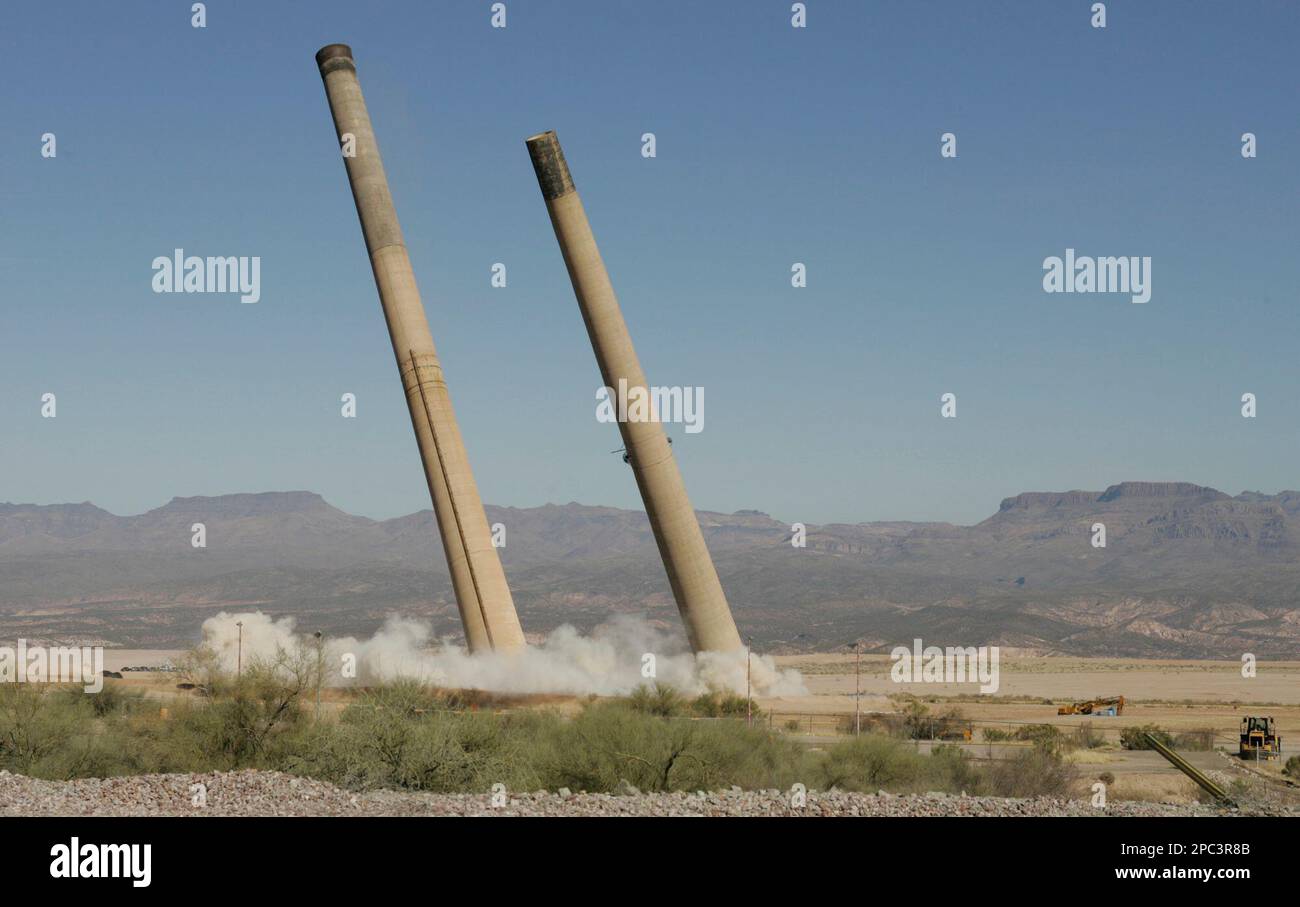 The smelter stacks at the former Magma Copper complex fall during ...