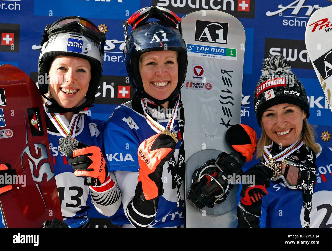 The three Austrian athletes, second placed Marion Kreiner, winner Heidi ...