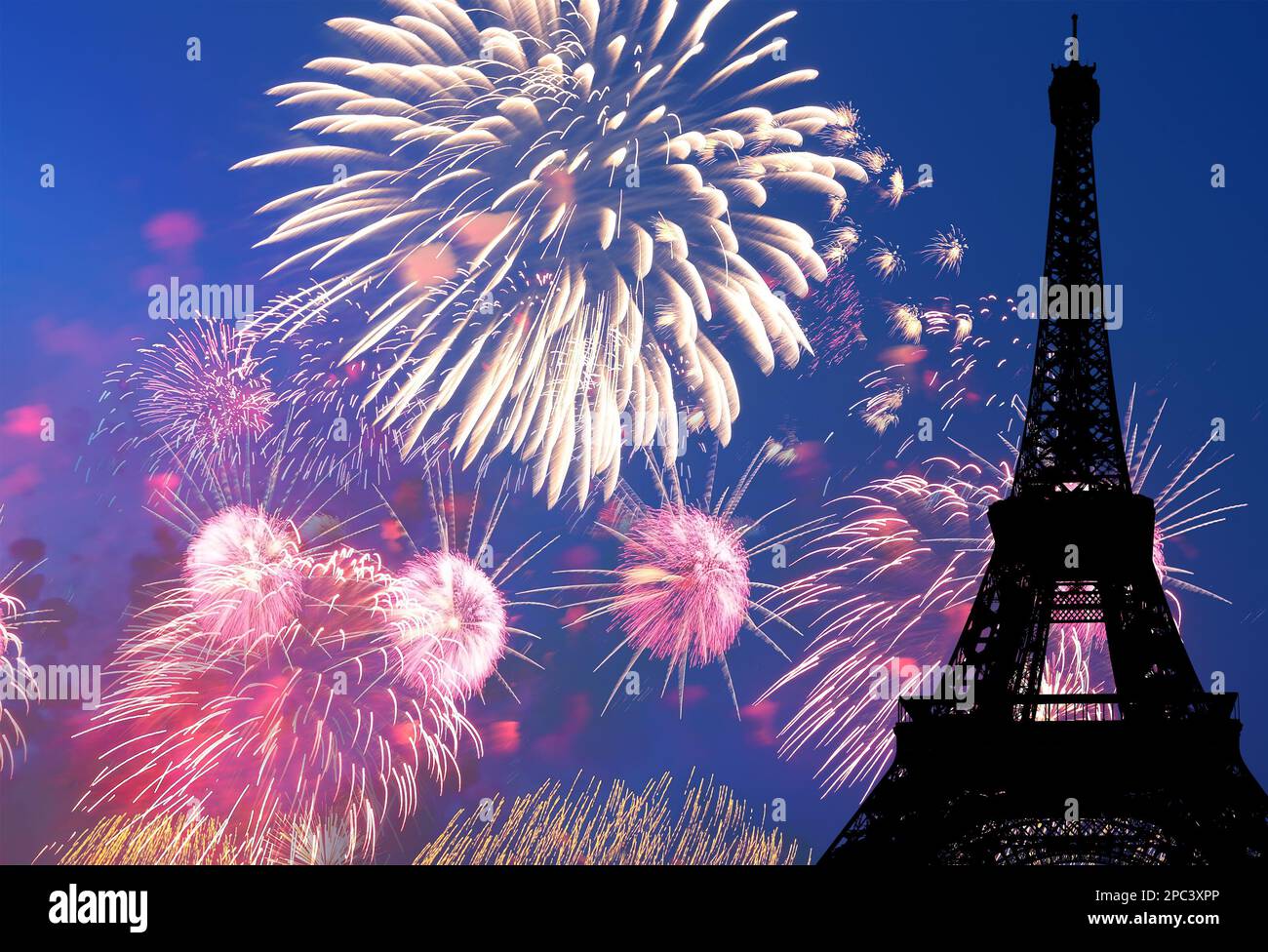 Celebratory colorful fireworks over the Eiffel Tower in Paris, France ...