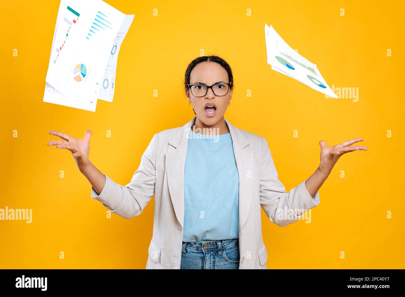 Annoyed angry mixed race business woman with glasses, in elegant wear ...