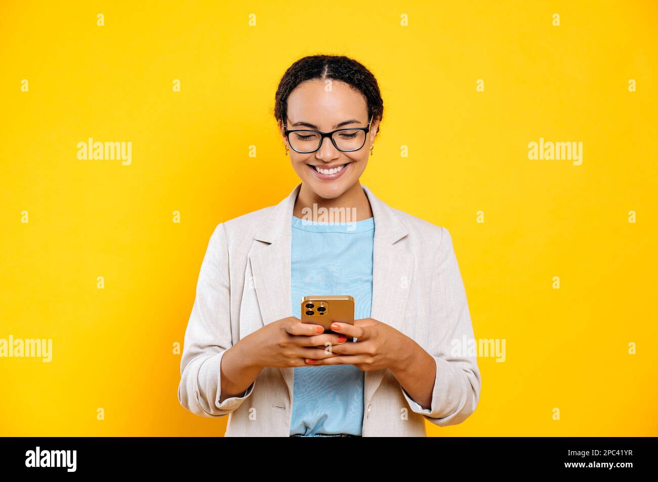 Positive successful busy hispanic or brazilian woman, using her smart ...