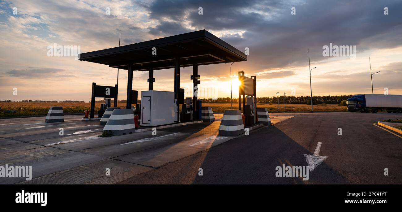 Modern self service gas station against the backdrop of a dramatic ...
