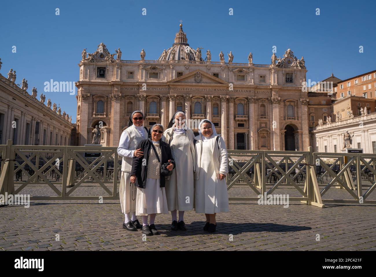 Rome, Italy. 13 March 2023. A group of nuns pose in front Saint Peter's ...