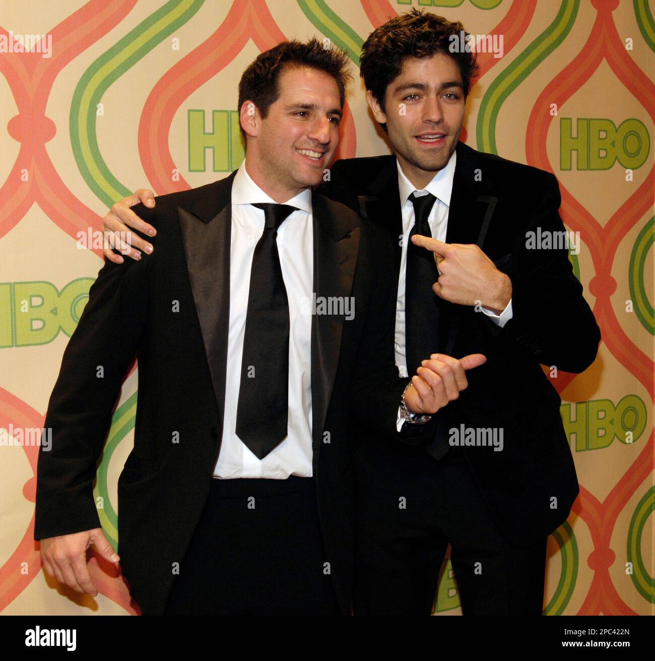 "Entourage" star Adrian Grenier, right, jokes around with executive ...