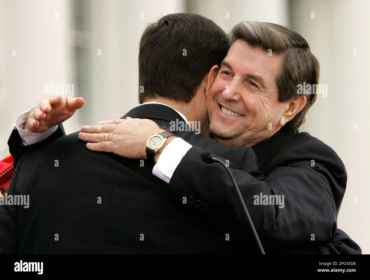 Alabama Gov. Bob Riley hugs his son, Rob, after being sworn in for his ...