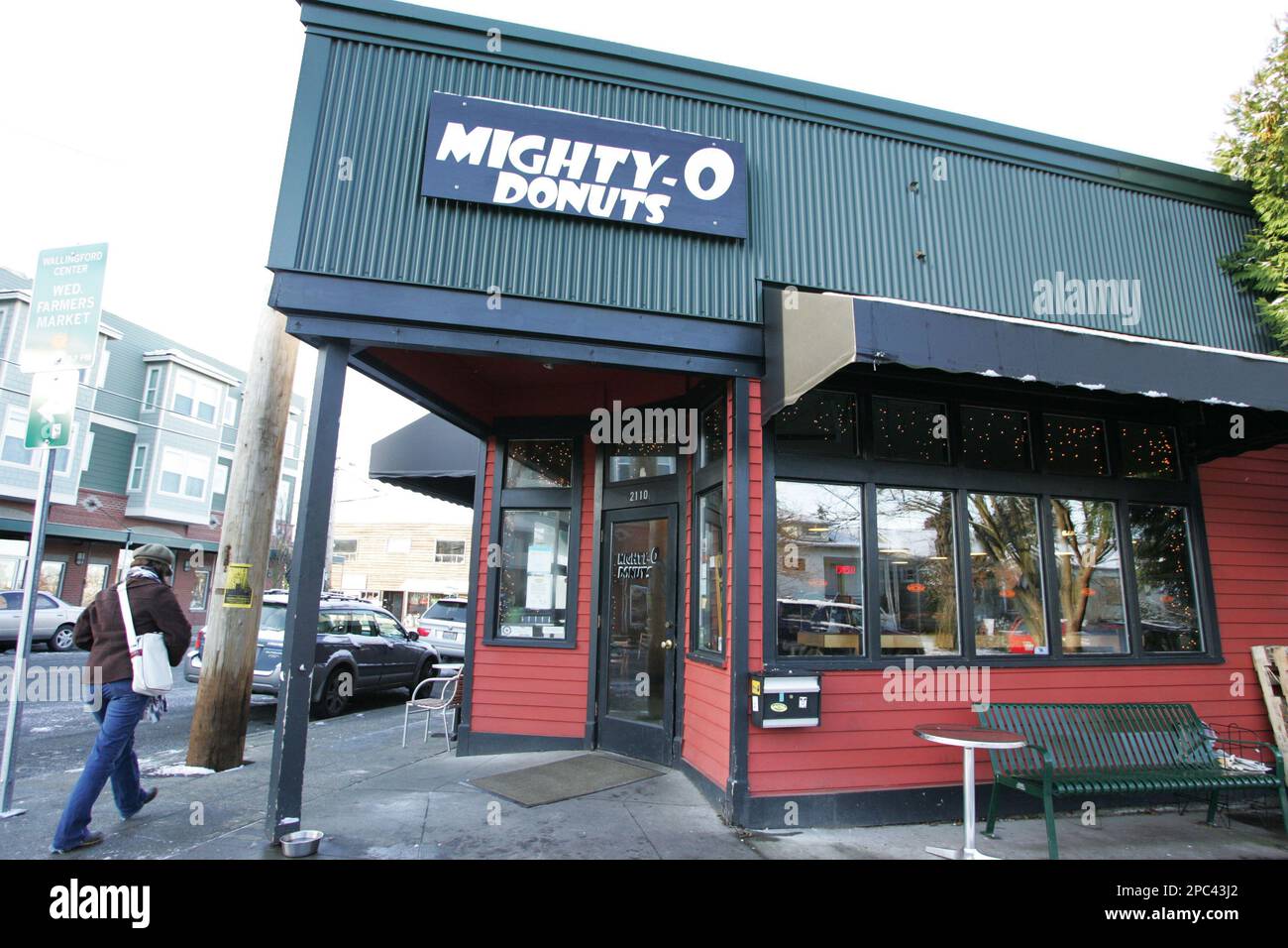 A pedestrian passes Mighty-O Donuts in Seattle on Thursday, Jan. 11 ...