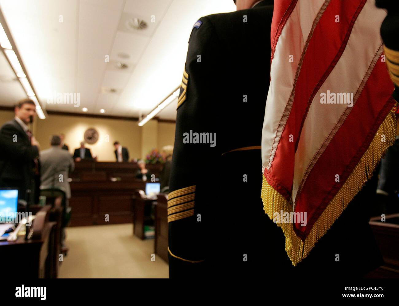 The U.S. flag arrives in the House of Representatives at the start of ...