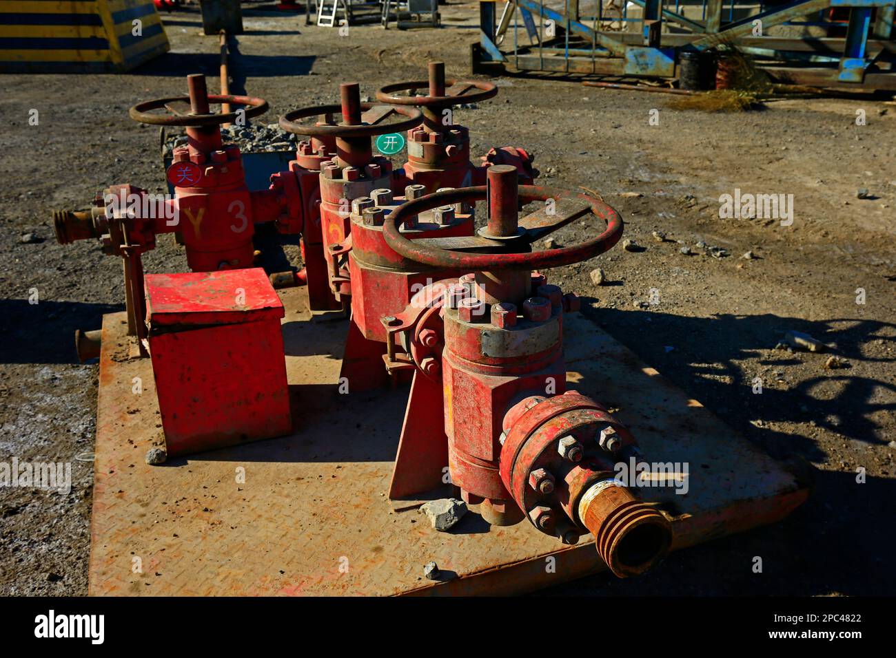 Oil pipes and valves Stock Photo - Alamy