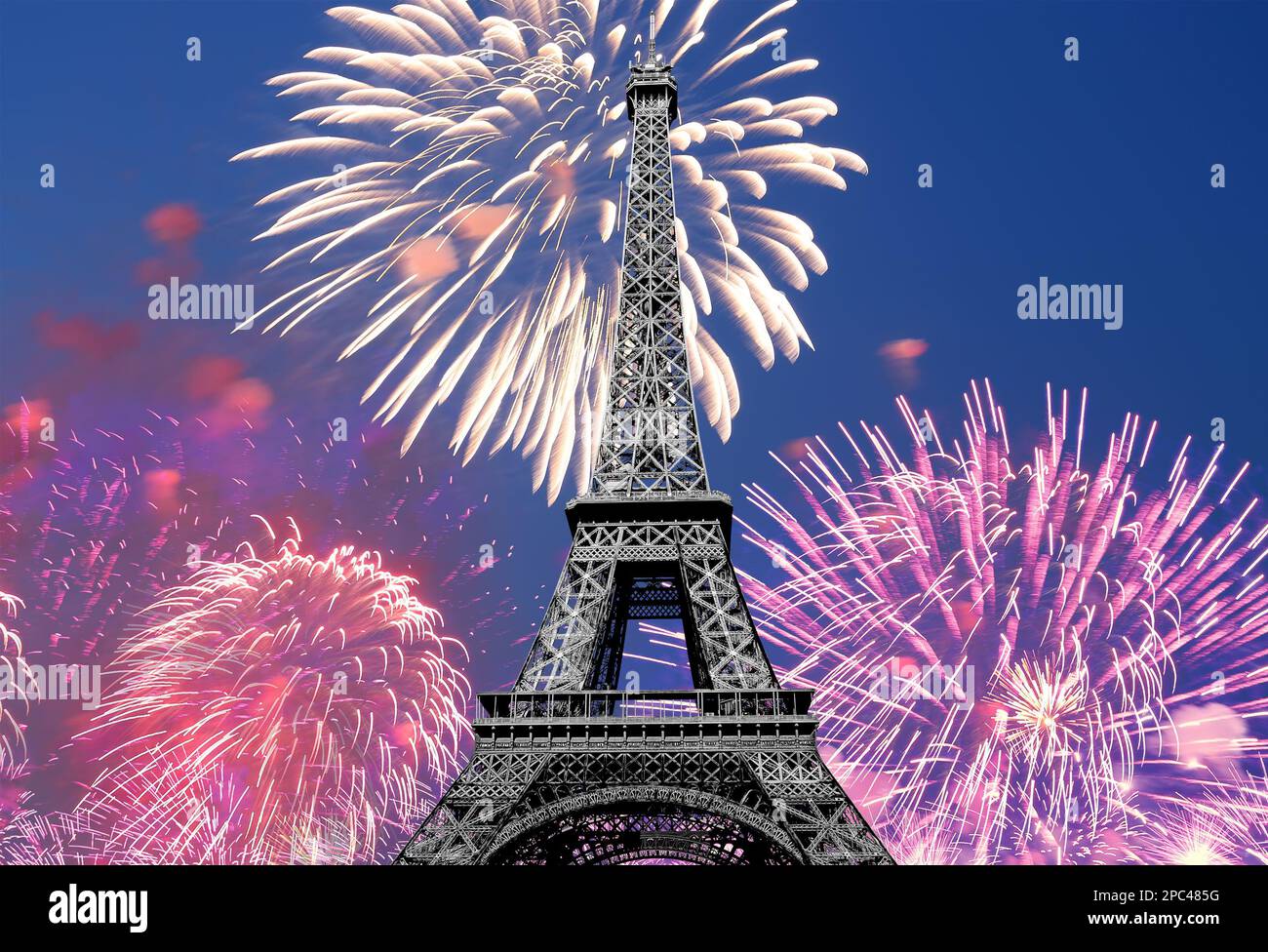 Celebratory colorful fireworks over the Eiffel Tower in Paris, France ...