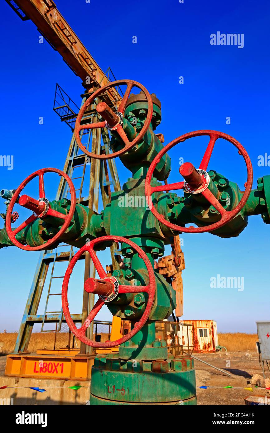 Oil pipes and valves Stock Photo - Alamy