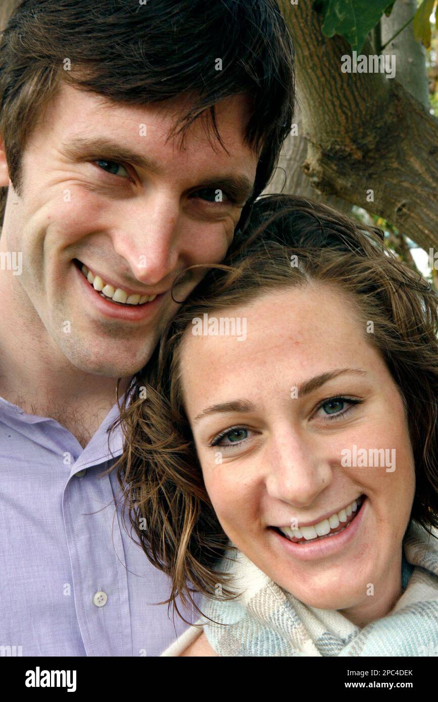 Mike Buday, left, and his wife Diana Bijon pose for a photograph ...