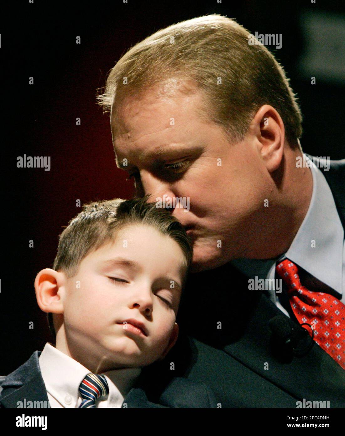 Iowa Gov. Chet Culver kisses his son John on the head before taking the ...