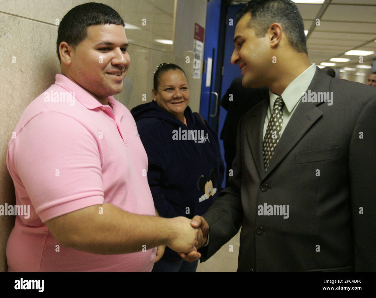 Jonathan Roman, left, a dishwasher who faces a first-degree murder ...