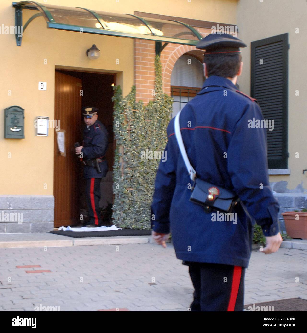 Italian Carabinieri officers inspect Friday Jan. 12, 2007 the apartment ...
