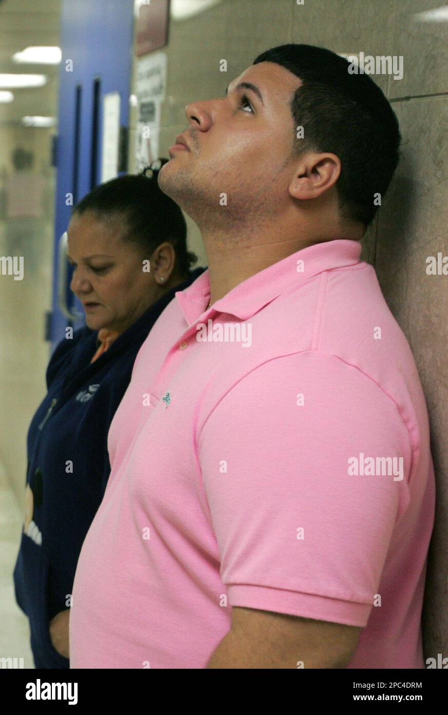 Jonathan Roman, right, a dishwasher who faces a first-degree murder ...