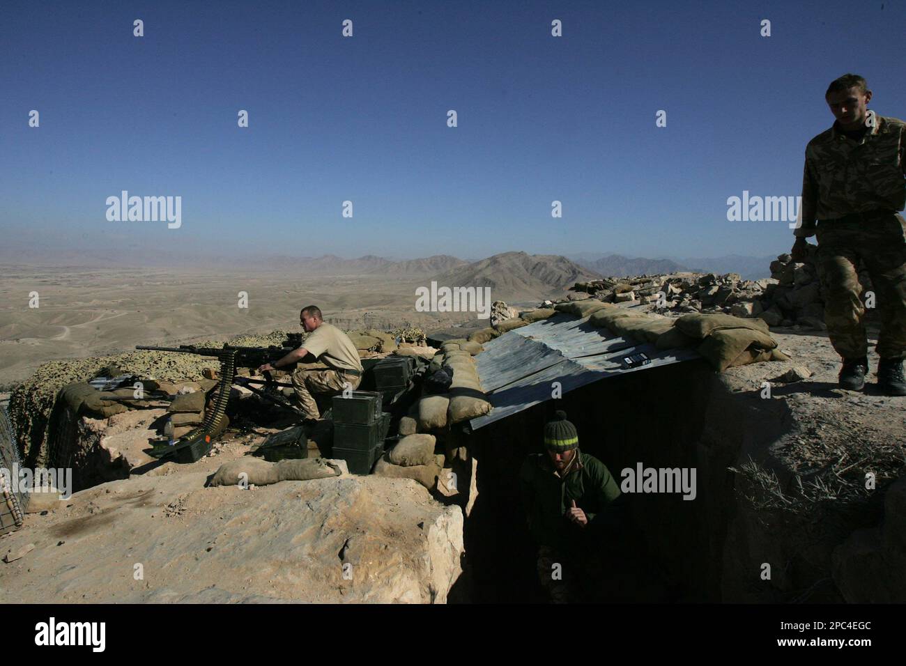 Soldiers of 42 Commando of the British Royal Marines run into position ...
