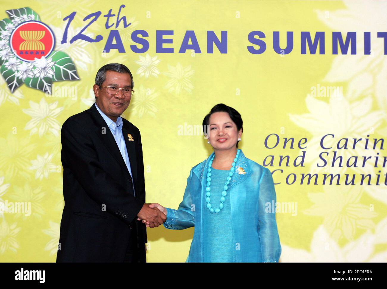Cambodian Prime Minister Hun Sen, left, is greeted by Philippine ...