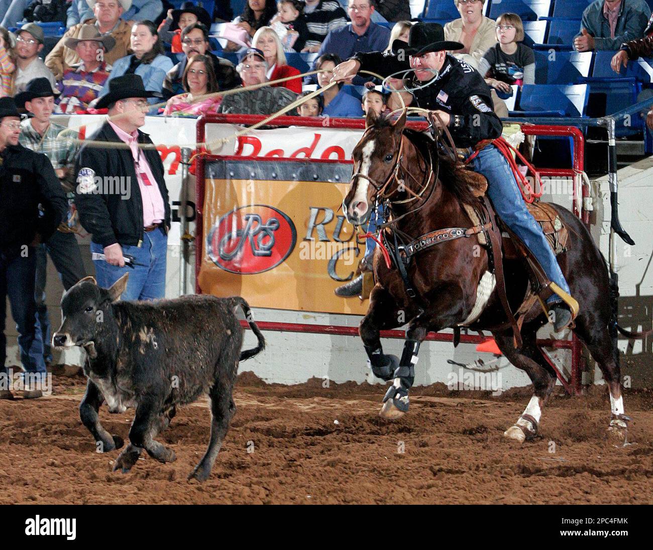 Trevor Brazile, of Decatur, Texas, busts out of the chute and looks to ...