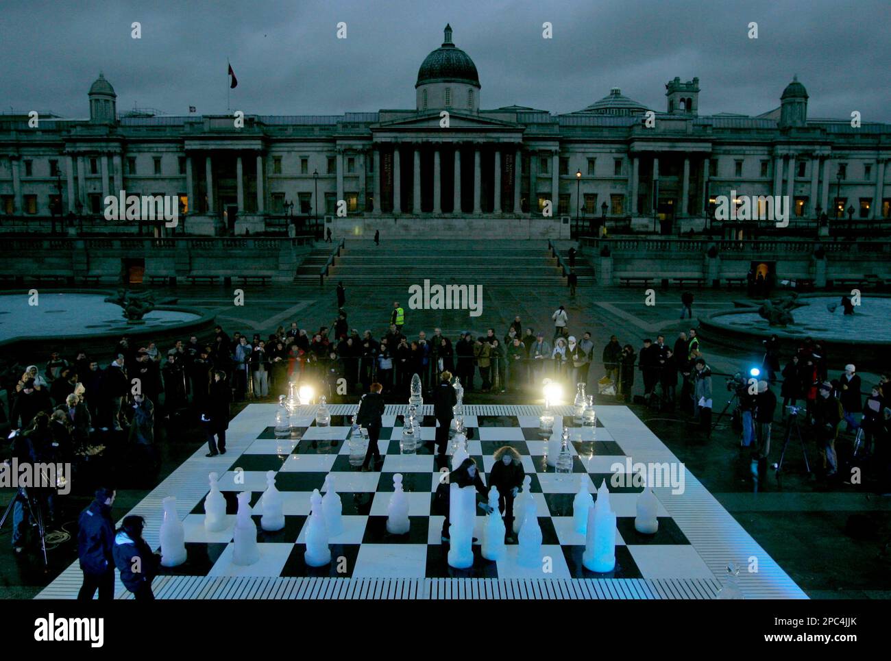 Giant ice chess pieces are moved during the world's first international ...