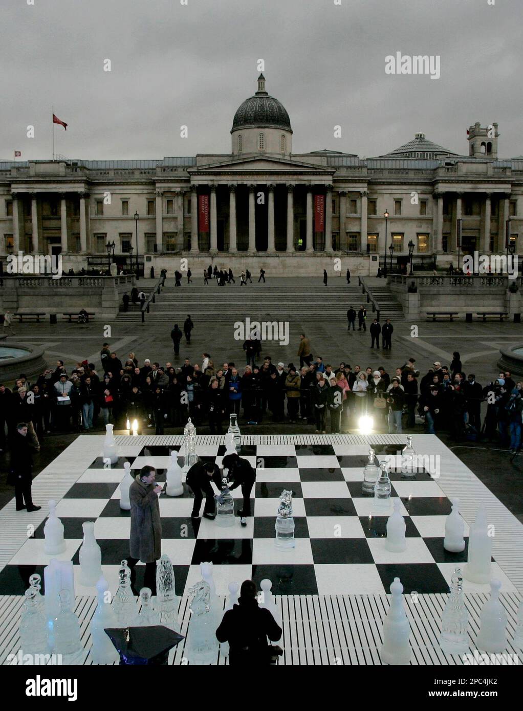 Giant ice chess pieces are moved during the world's first international ...