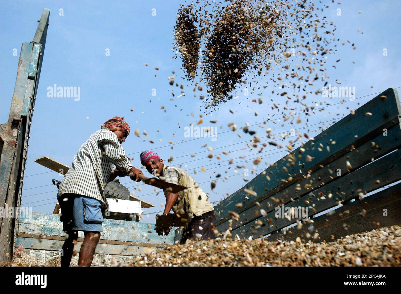 Indian porters work at the Akhaura India-Bangladesh border check post ...