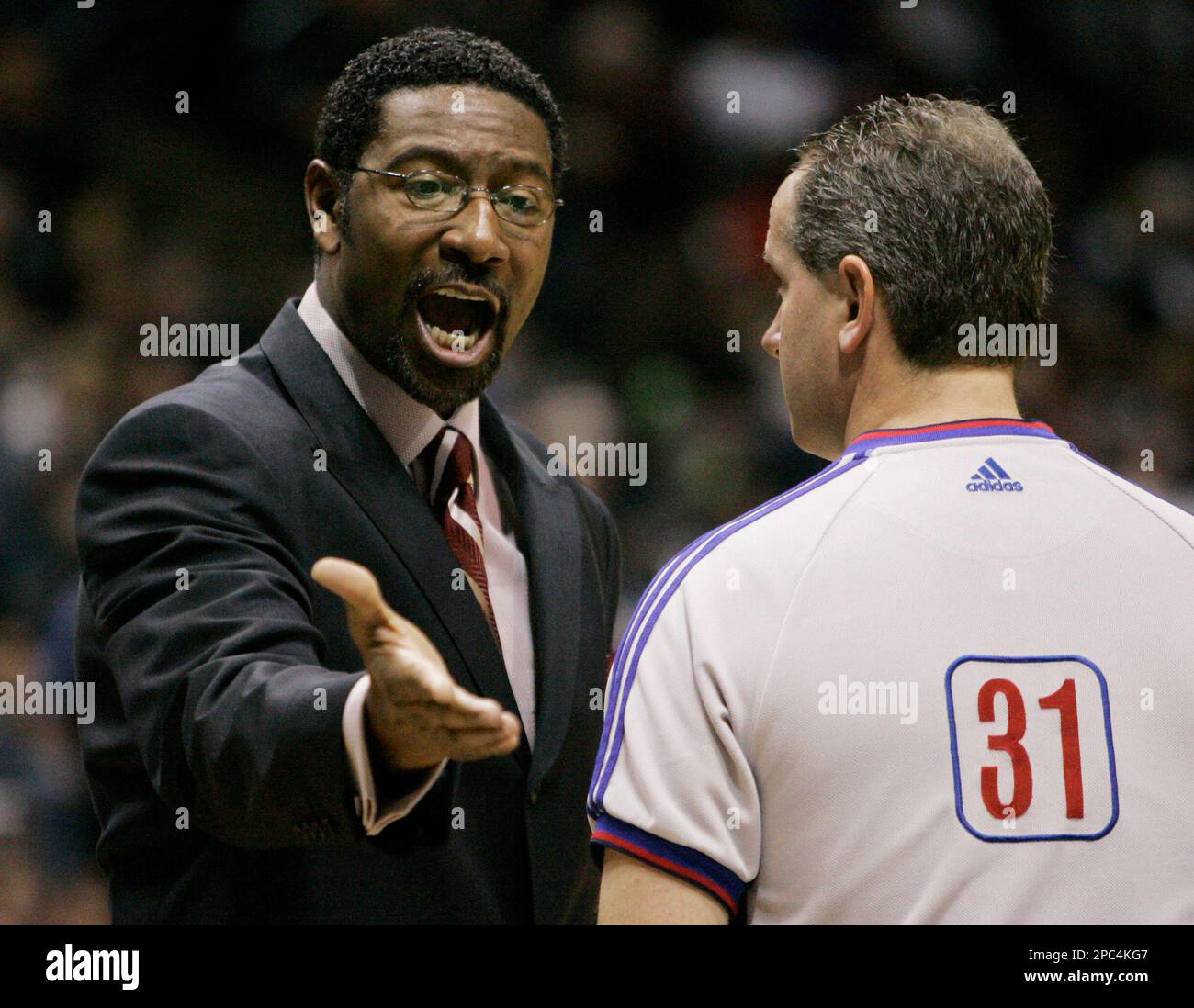 Toronto Raptors coach Sam Mitchell argues a call with referee Scott ...