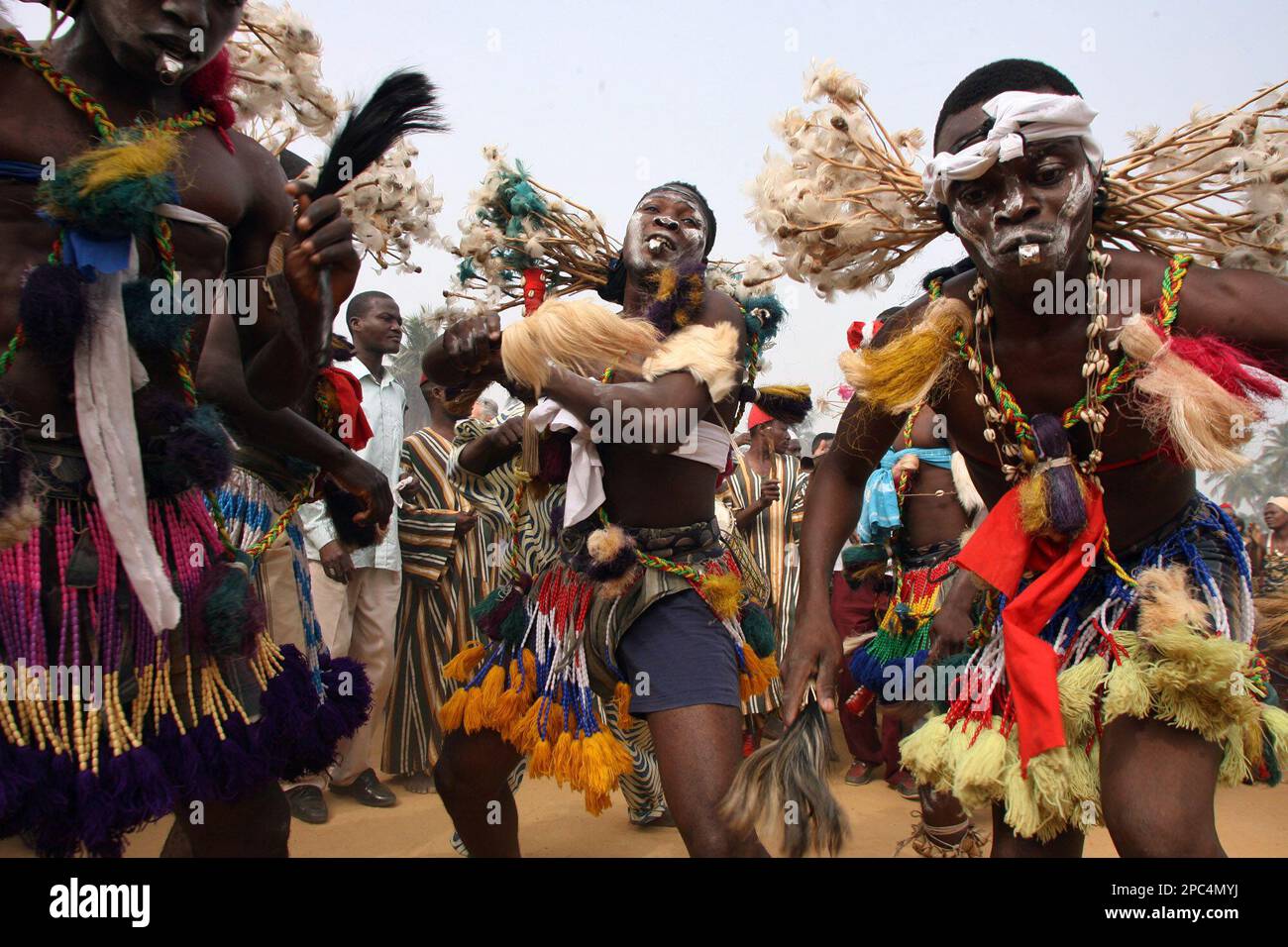 Voodoo followers dance in Ouidah, Benin Republic, Wednesday, Jan. 10 ...