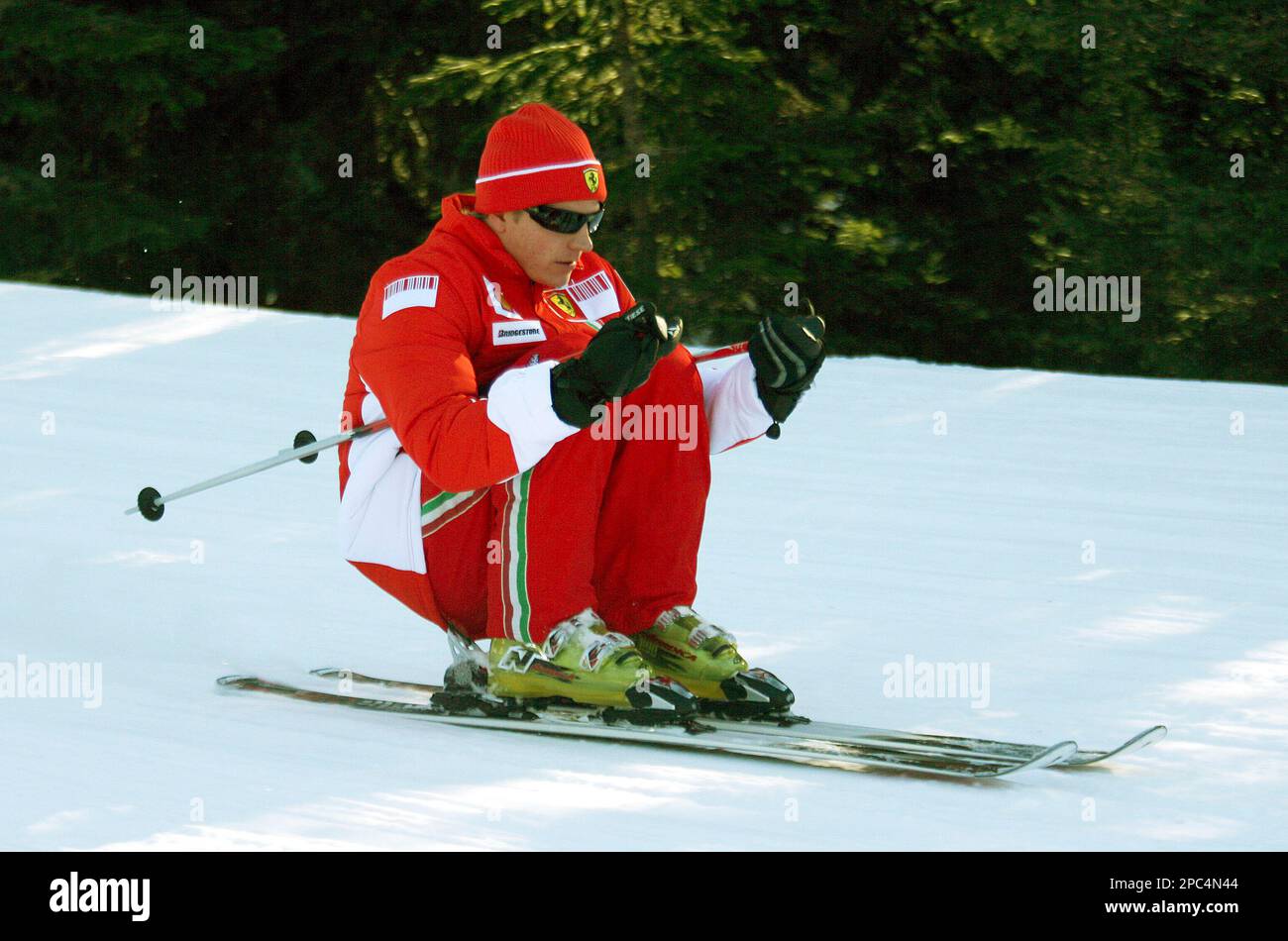 New Ferrari Formula One driver Kimi Raikkonen from Finland relaxes while skiing in Madonna Di ...